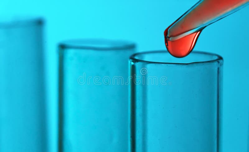 Drop from Pipette Drips into Test Tubes Stock Image - Image of ...