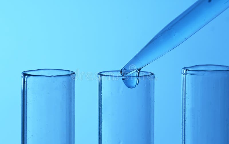 Drop from Pipette Drips into Test Tubes Stock Image - Image of ...
