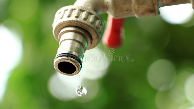 A Drop of Pure Water Dripping from the Tap. Stock Image - Image of ...