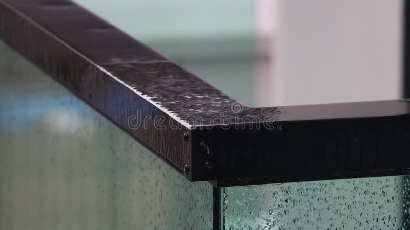A Drop of Rain Fall on a Railing on a Balcony, Slow Motion Stock Video ...