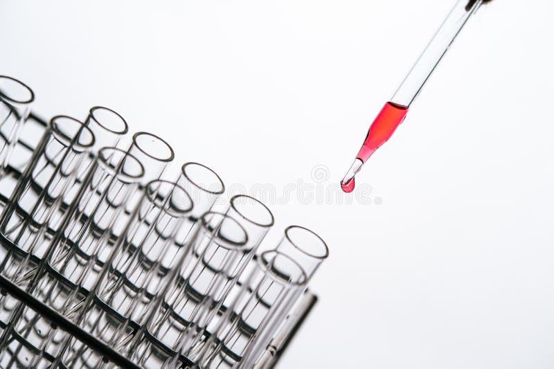Drop the Red Chemicals into the Beaker Stock Photo - Image of chemist ...