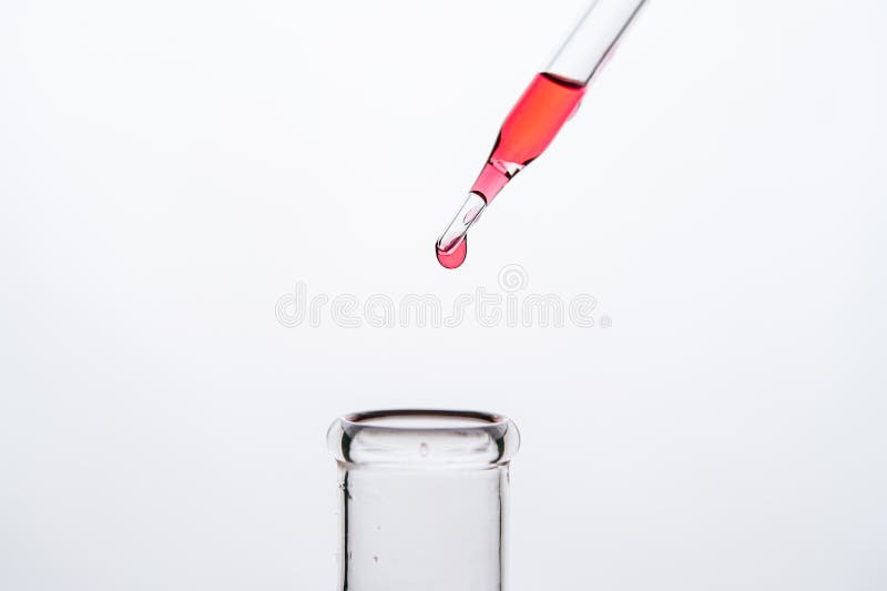 Drop the Red Chemicals into the Beaker Stock Photo - Image of ...