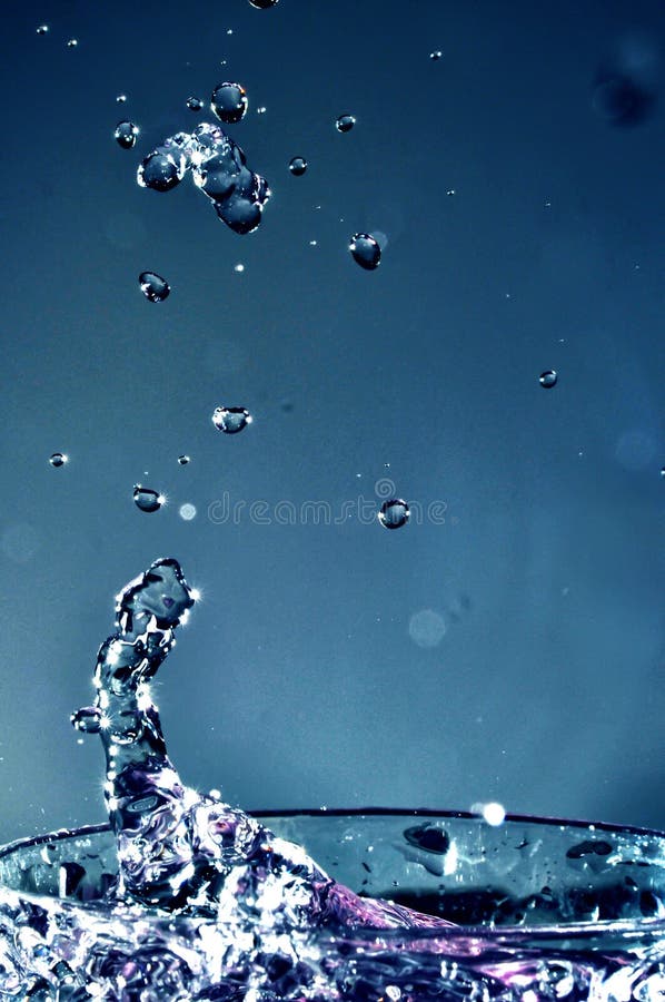 319 Drop Splashing Purple Water Falling Blue Background Stock Photos ...