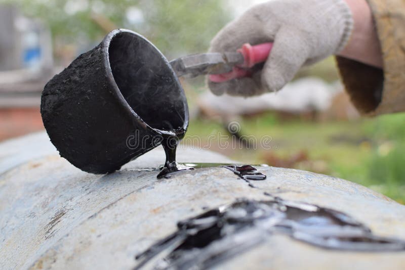 Melting Black Tar in Metal Cup on Bonfire Steam Stock Image - Image of ...