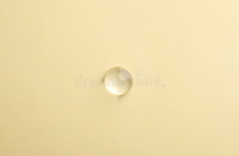 Drop of Transparent Ointment on Beige Background, Top View Stock Image ...