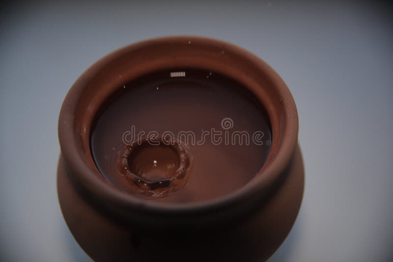 A Drop of Water in a Clay Pot Stock Image - Image of liquid, wave: 94852719