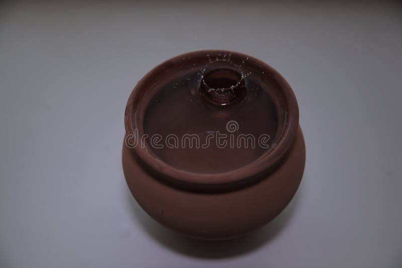 A Drop of Water in a Clay Pot Stock Image - Image of wave, vessel: 94852581