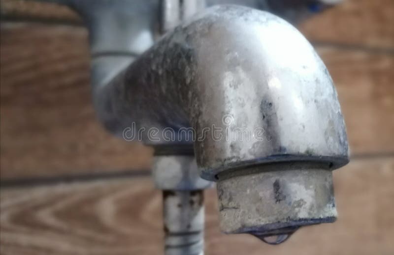 Water Coming Out of a Gutter Drain Pipe Stock Image - Image of freezing ...