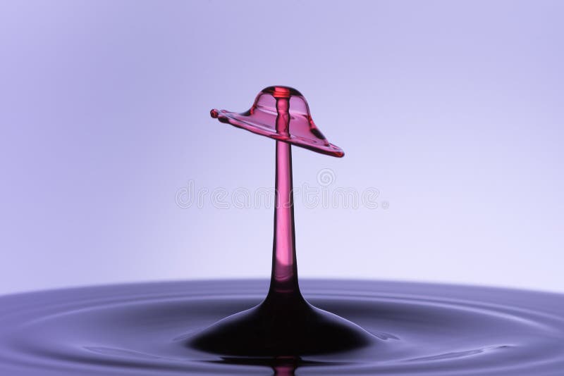 A Drop of Water Creating a Hat Shape Structure when Another Droplet ...