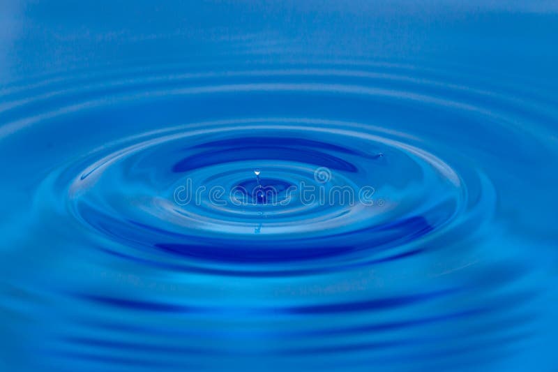 A Drop of Water Falling in Blue Water Stock Image - Image of freshness ...