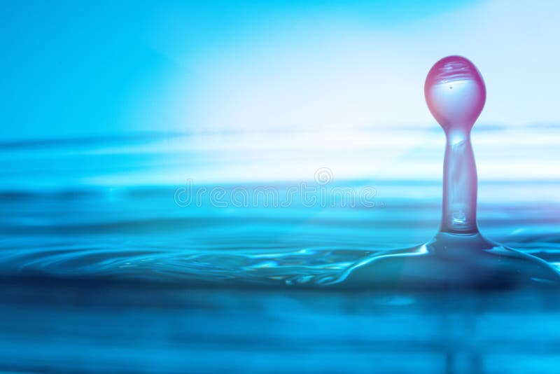 Drop of Water Falling into Still Water Stock Photo - Image of cold ...