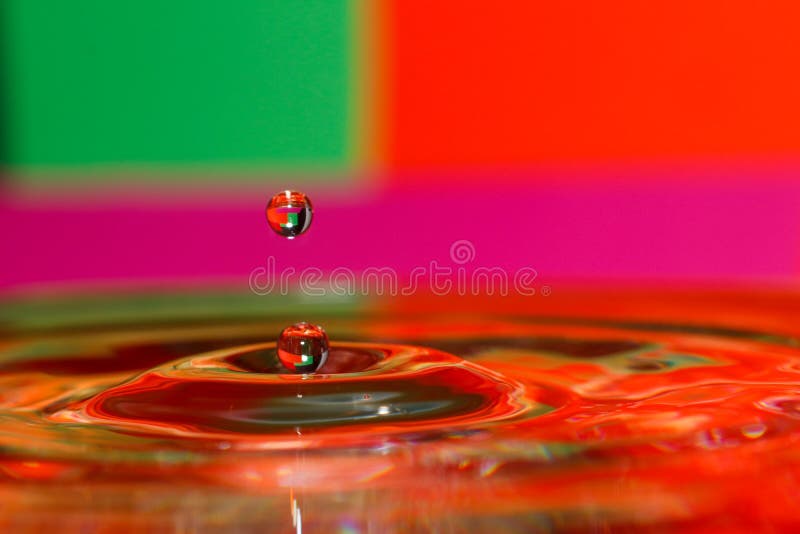 Drop of Water Red, Pink and Green Stock Photo - Image of water, orange ...