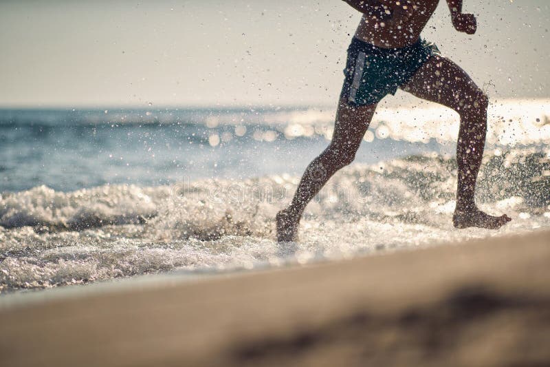 Drop of Water Shining when Muscular Man Run in Water Stock Image ...
