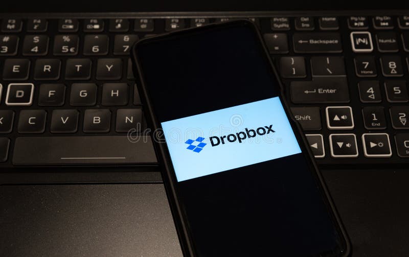Dropbox Logo on Mobile Phone , Background is a Keyboard , Sydney ...