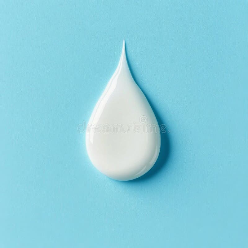 Droplet of Cream on a Light Blue Background Demonstrating Texture and ...