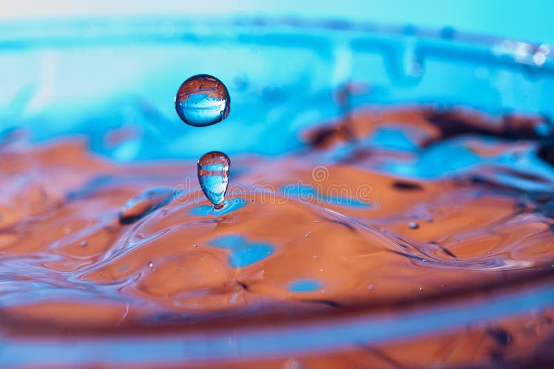 Droplet Falling in the Blue Water Stock Photo - Image of blue ...