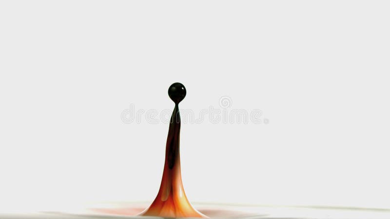 Droplet falling on paint stock video. Video of dropping - 40067647