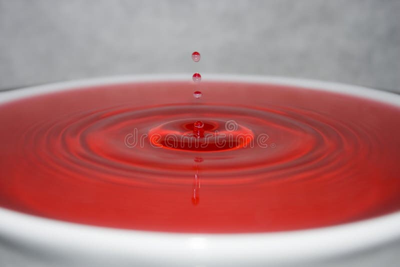 Droplet in red water stock image. Image of abstract, wave - 6862777