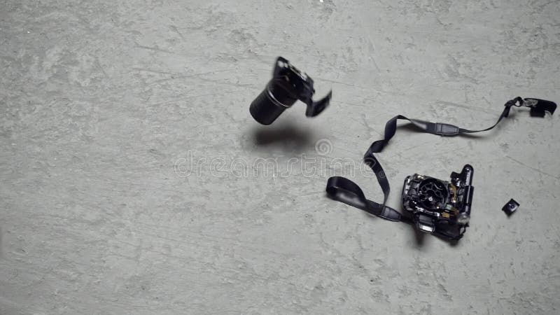 Dropped and Shattered SLR Camera in Slow Motion Stock Video - Video of ...