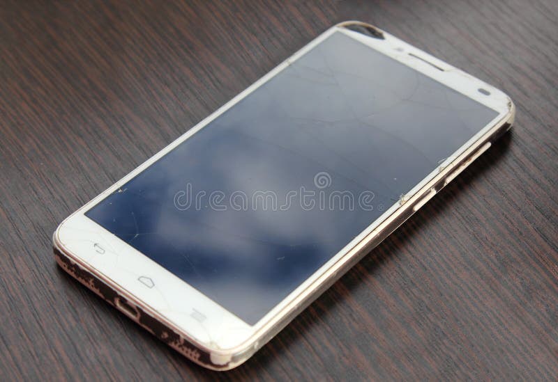 Dropped Smartphone with Broken Screen on Wooden Table Stock Photo ...