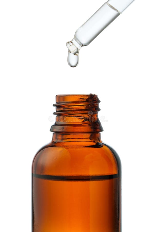 Dropper Bottle with Liquid Dropping on a White Background Stock Photo ...
