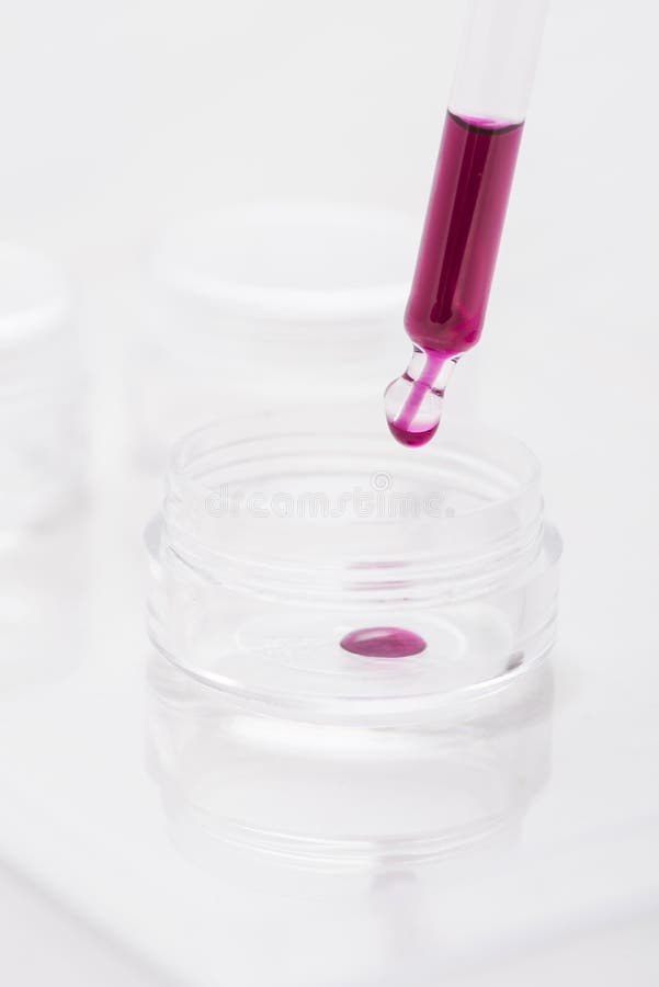 Dropper and Containers with Fluid in Research Lab Stock Photo - Image ...