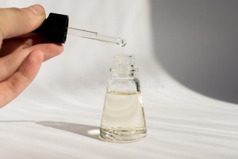 Dropper of Essential Oil, Aromatherapy Essence, or Medicinal Liquid on ...
