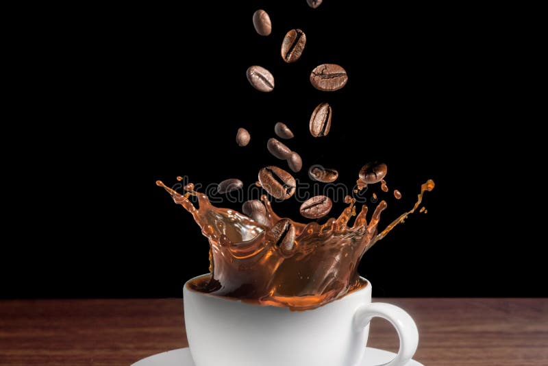 Dropping Coffee Beans on Coffee Cup Stock Image - Image of falling ...