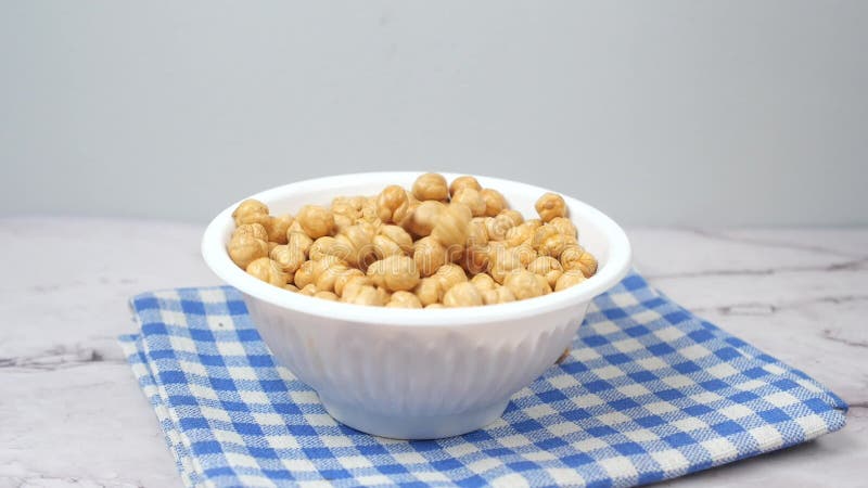 Dropping Indonesia Peanuts in a Bowl Stock Video - Video of nutrition ...