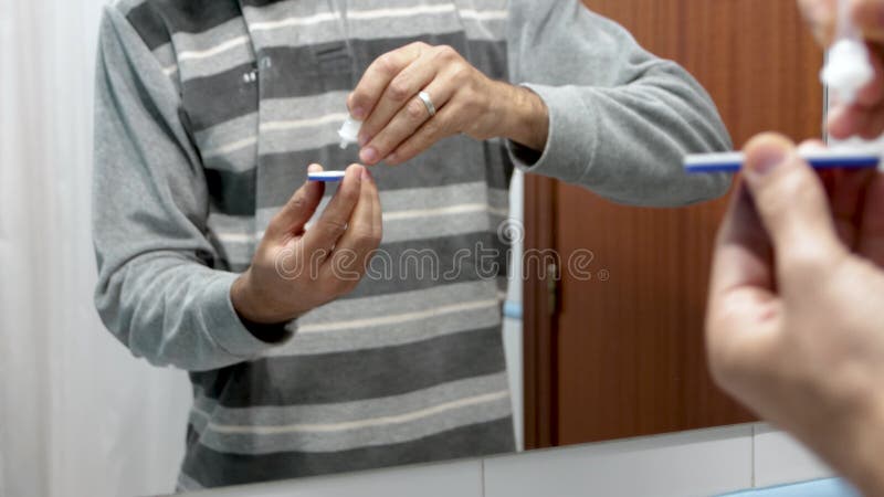 Dropping Solution from the Covid Antigen Test Sample into the Test ...