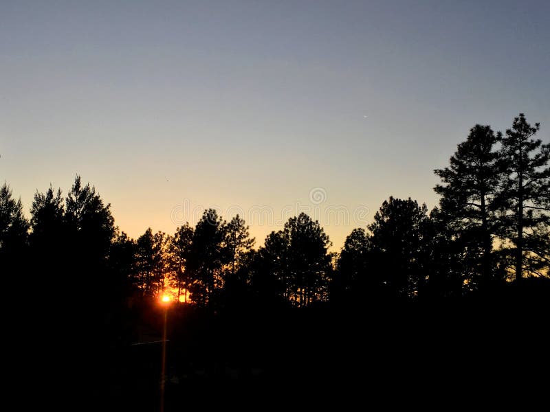 Dropping the Sun stock image. Image of sunset - 100875747