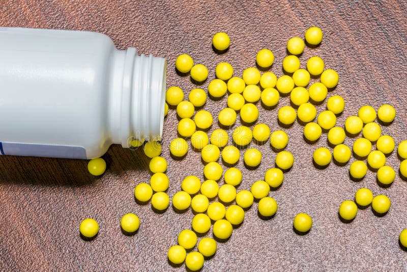 Drops of Ascorbic Acid on Wooden Table Stock Photo - Image of drugs ...