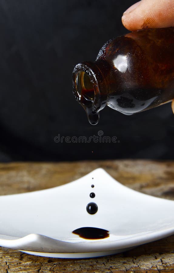 Drops of Balsamic Vinegar on the Plate Stock Image - Image of balsamico ...