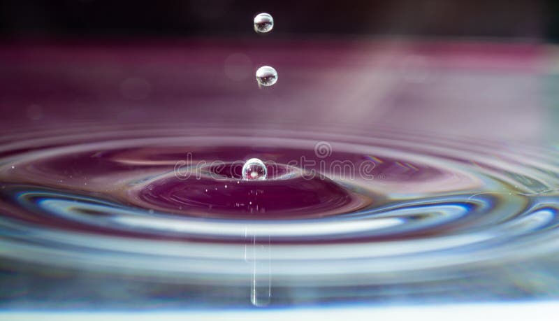 Drops Caught Mid Air and the Ripple Stock Photo - Image of ripple ...