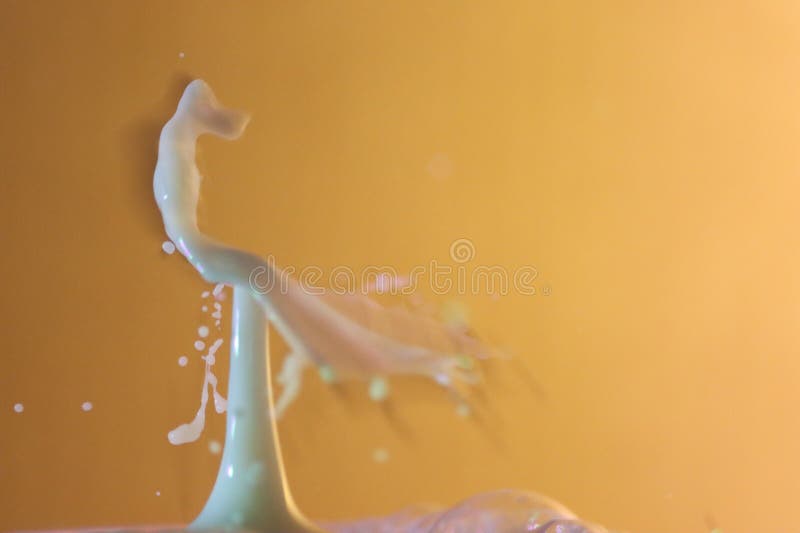 Drops Colliding and Forming a Spectacular Image Abstract Random Shapes ...