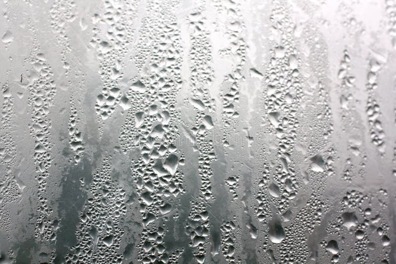 Drops of Condensation on a Transparent Surface. Flowing Drops of Water ...