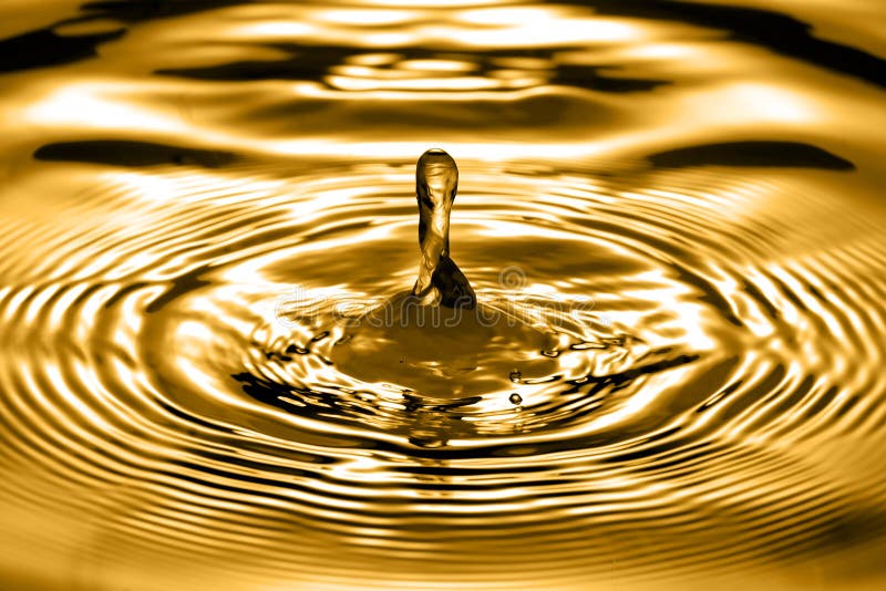 Drops of Liquid Gold Close Up Stock Image - Image of fluid, droplet ...