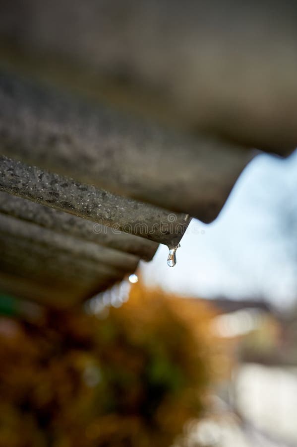 Drops of Melted Snow Fall from the Roof Stock Photo - Image of design ...