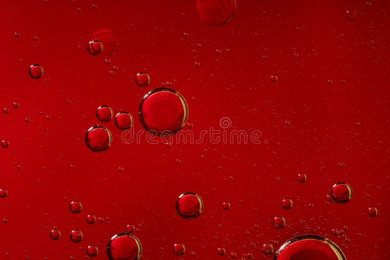 Drops of Oil on a Red Background Stock Image - Image of water, mixed ...