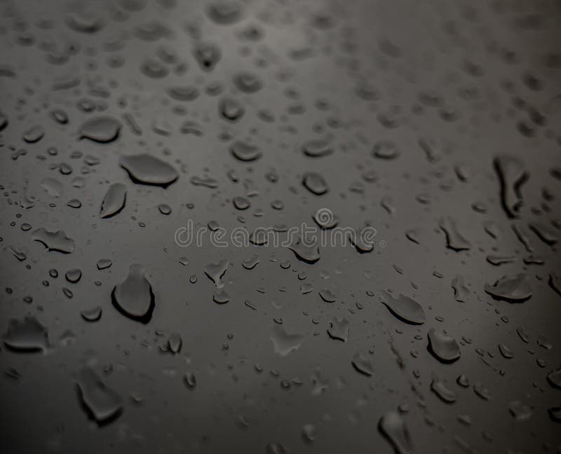 Drops of Rain on a Black Dramatic Window Glass Background. Autunm Rain ...