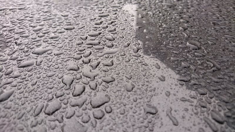 Drops after Rain Form Interesting Patterns on the Smooth Surface Stock ...