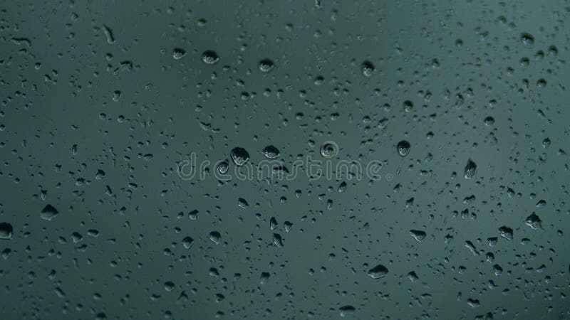 Drops of Rain on Window. Rain Running Down Window. Pan. Stock Photo ...