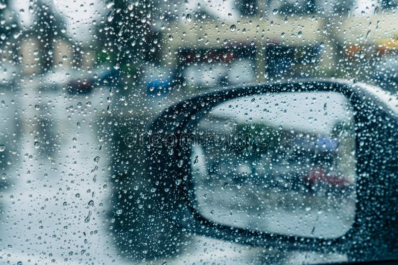 Drops of Rain on the Window and on the Wing Mirror Stock Image - Image ...