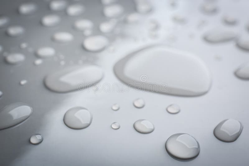 Drops of Spilled Water on Grey Background, Closeup Stock Photo - Image ...