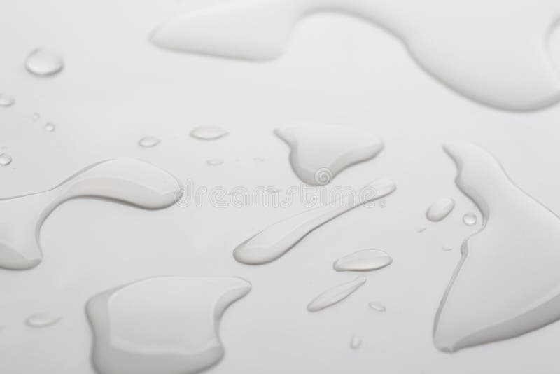 Drops of Spilled Water on Grey Background, Closeup Stock Photo - Image ...