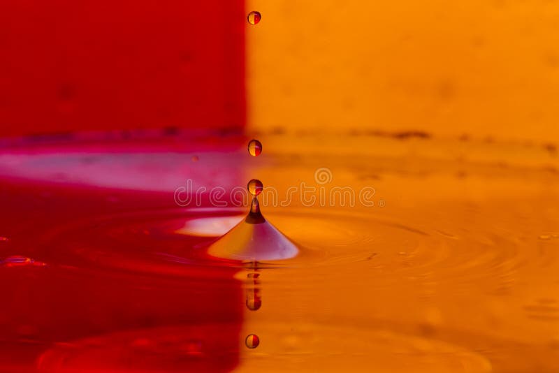 Drops, Sprays, Splashes of Water on a Colorful Background Stock Photo ...