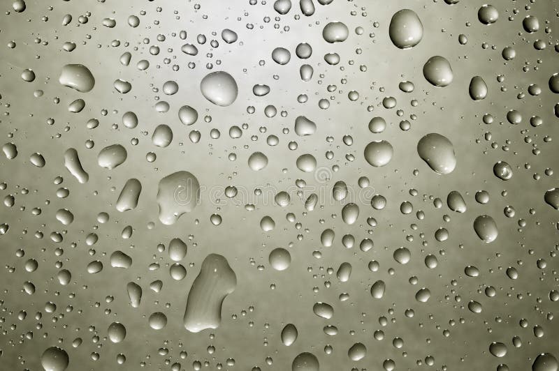 Golden Amber Water Drops stock image. Image of drink, shape - 4683827