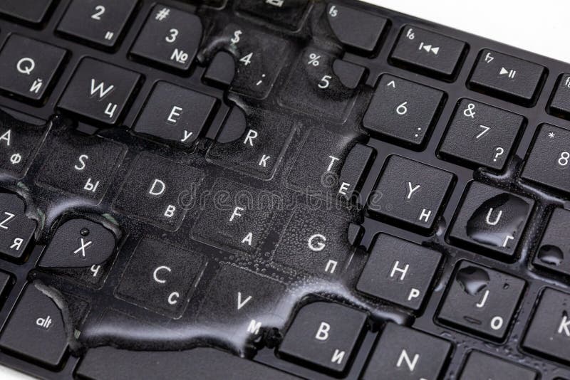 Liquid Spilled On A Black Keyboard Close-up Stock Photo - Image of ...