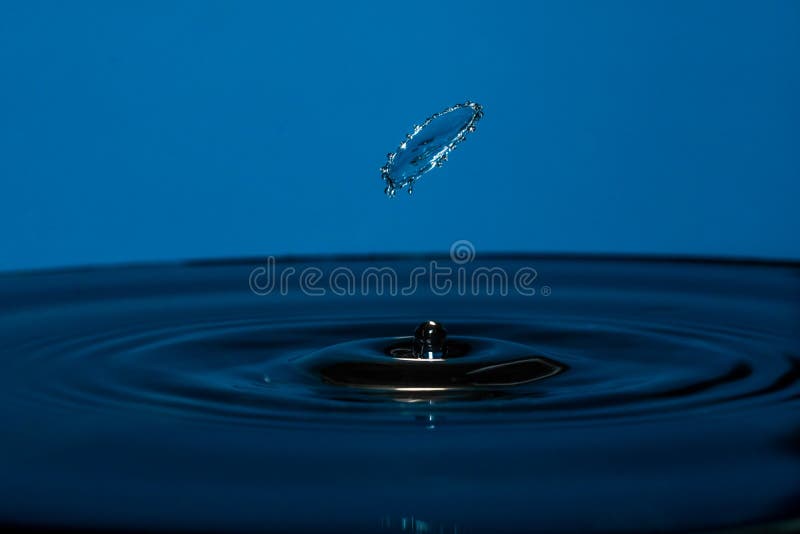 Drops of Water Fall into the Water Stock Photo - Image of flowing ...