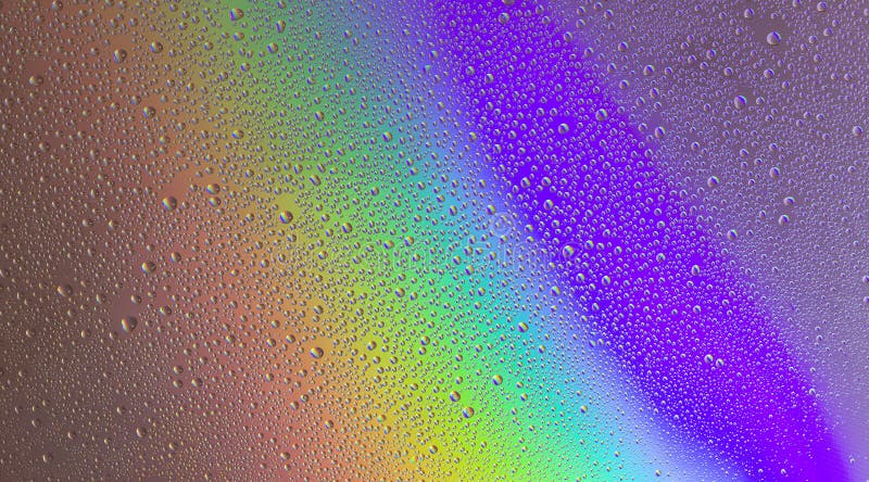 Drops of Water on the Glass, with the Reflection of the Rainbow Stock ...